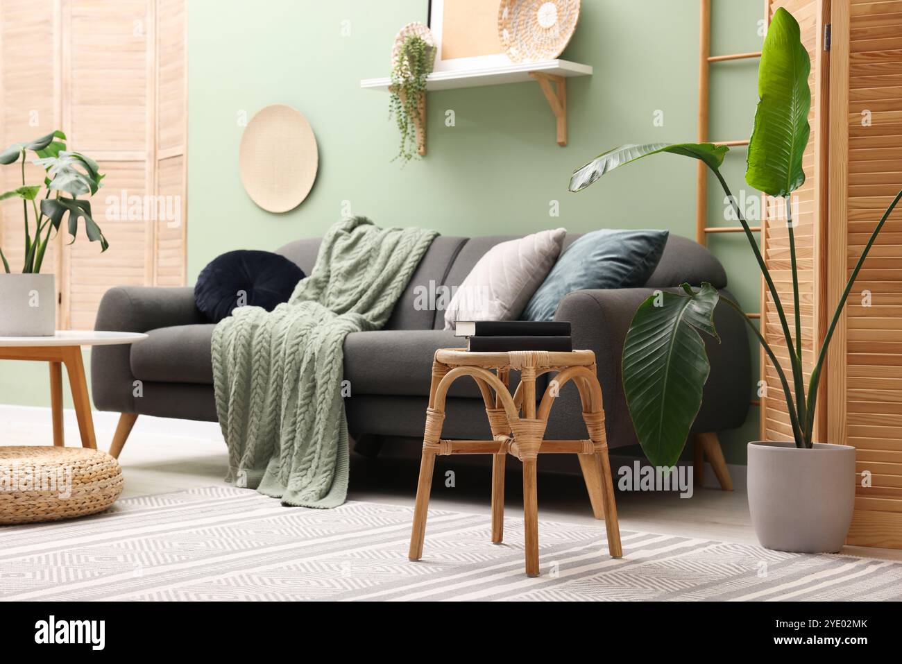 Living room with stool and sofa. Stylish interior design Stock Photo ...