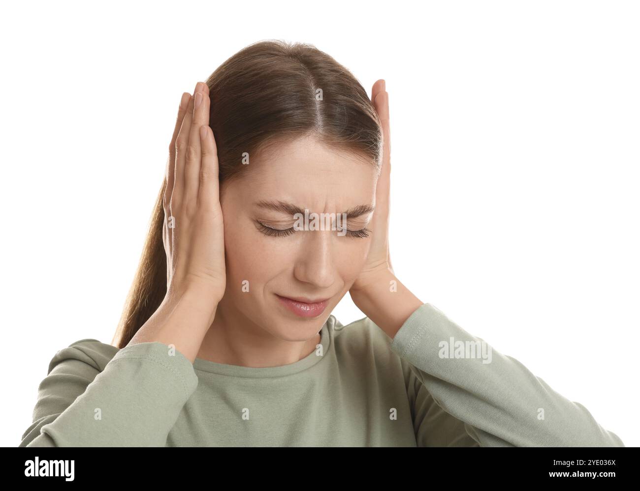Woman covering her ears on white background Stock Photo - Alamy
