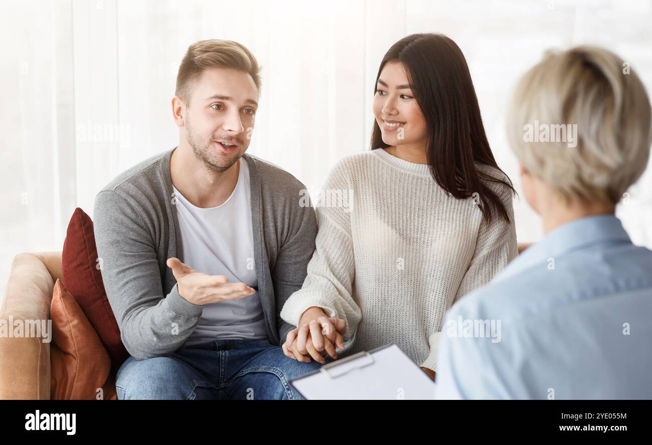 Spouses Talking With Psychologist During Appointment After ...