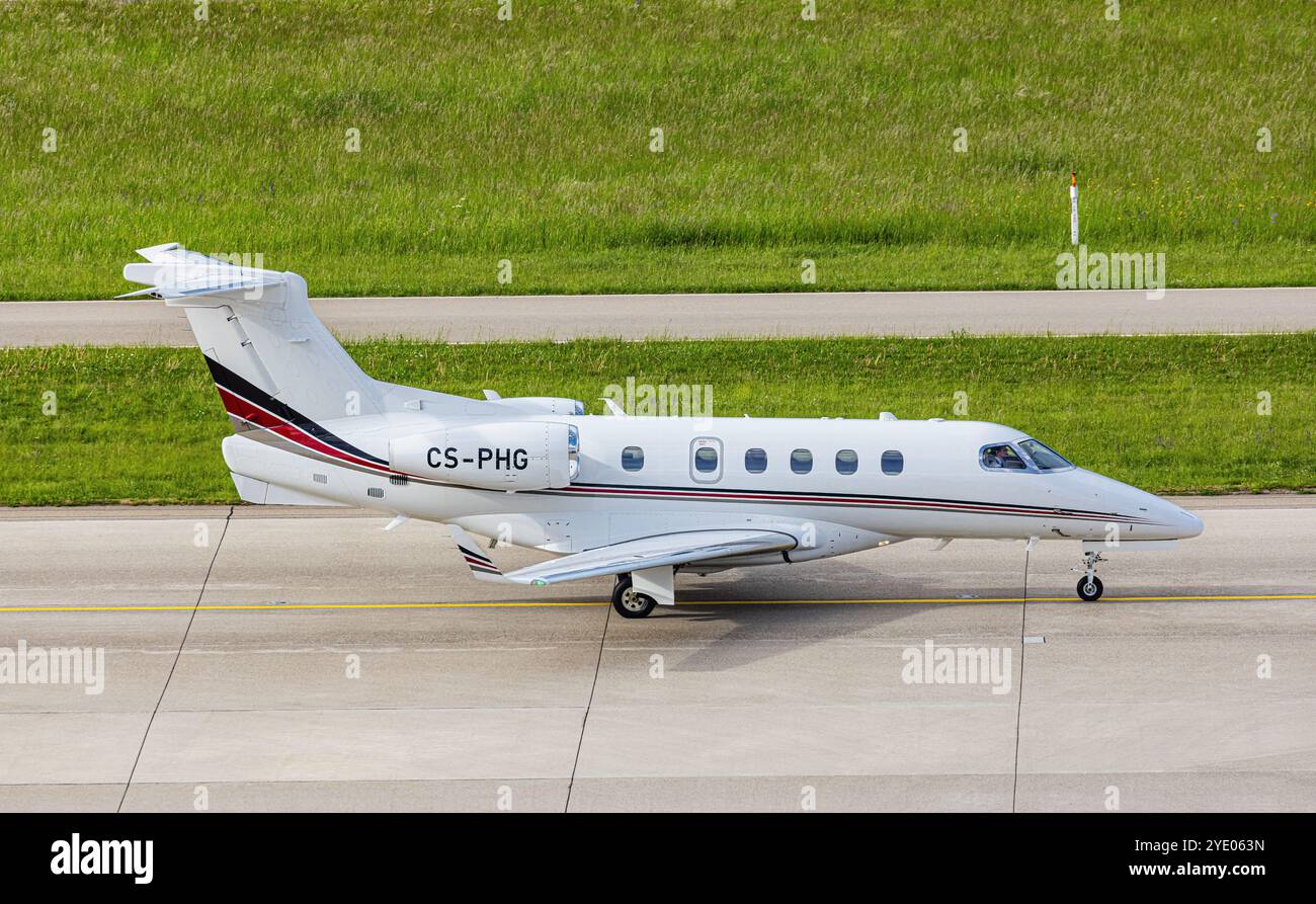 Zurich, Switzerland, 5th May 2024: A Netjets Embraer Phenom 300 taxis ...