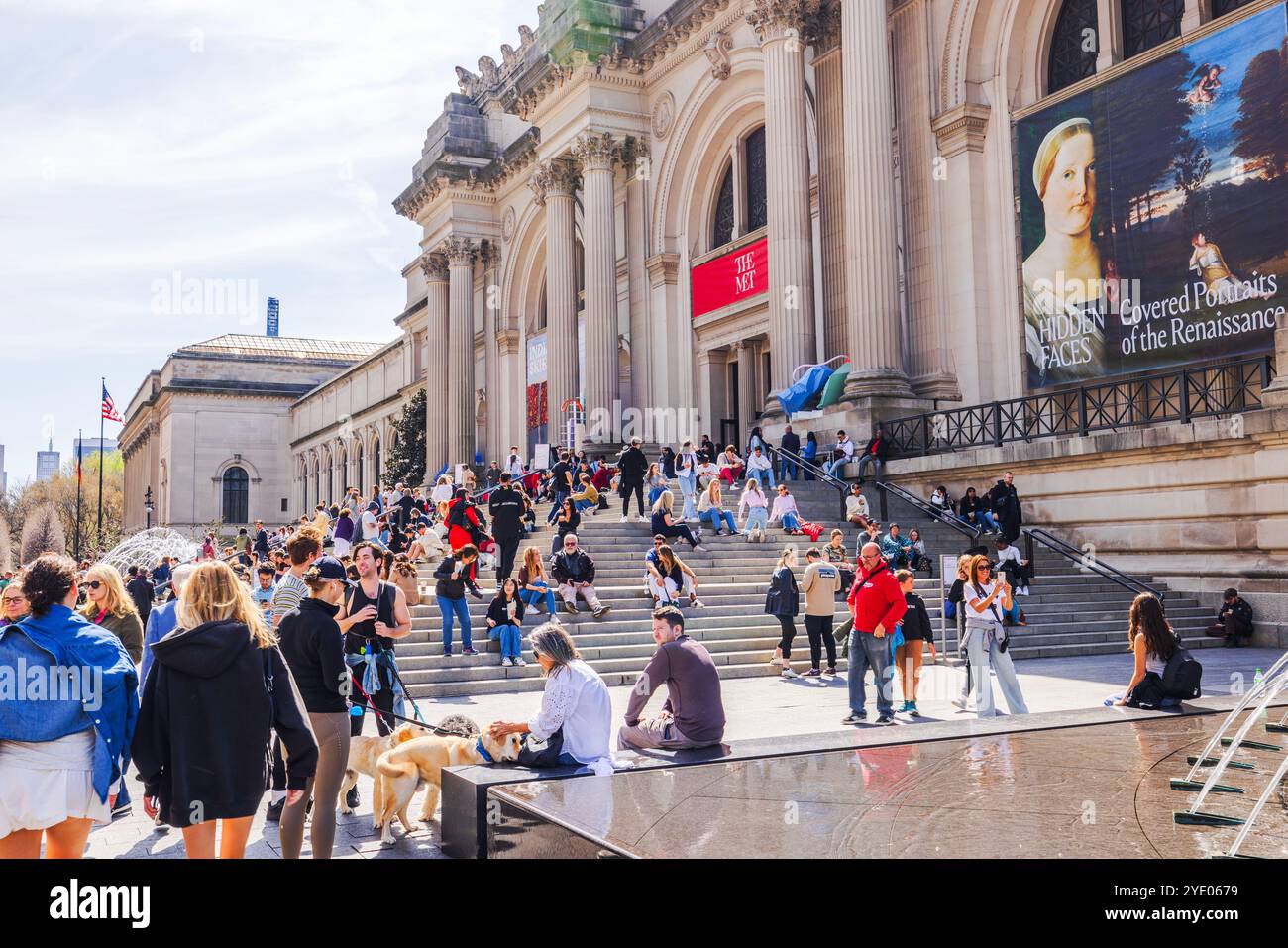 Visitors gather on The Met steps, enjoying sunny day outside iconic ...
