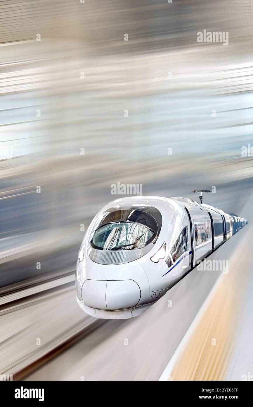 Modern high speed train at the railways station Stock Photo - Alamy