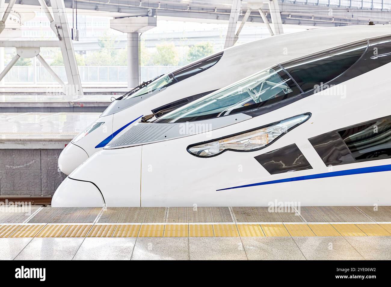 Modern high speed train at the railways station Stock Photo - Alamy
