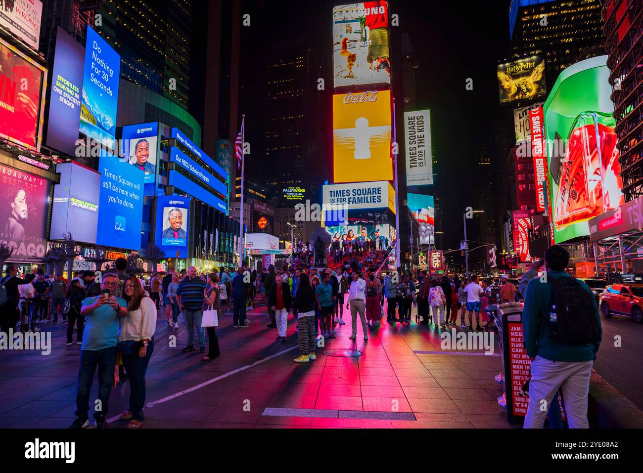 Vibrant night scene in Times Square, New York City, with bright ...
