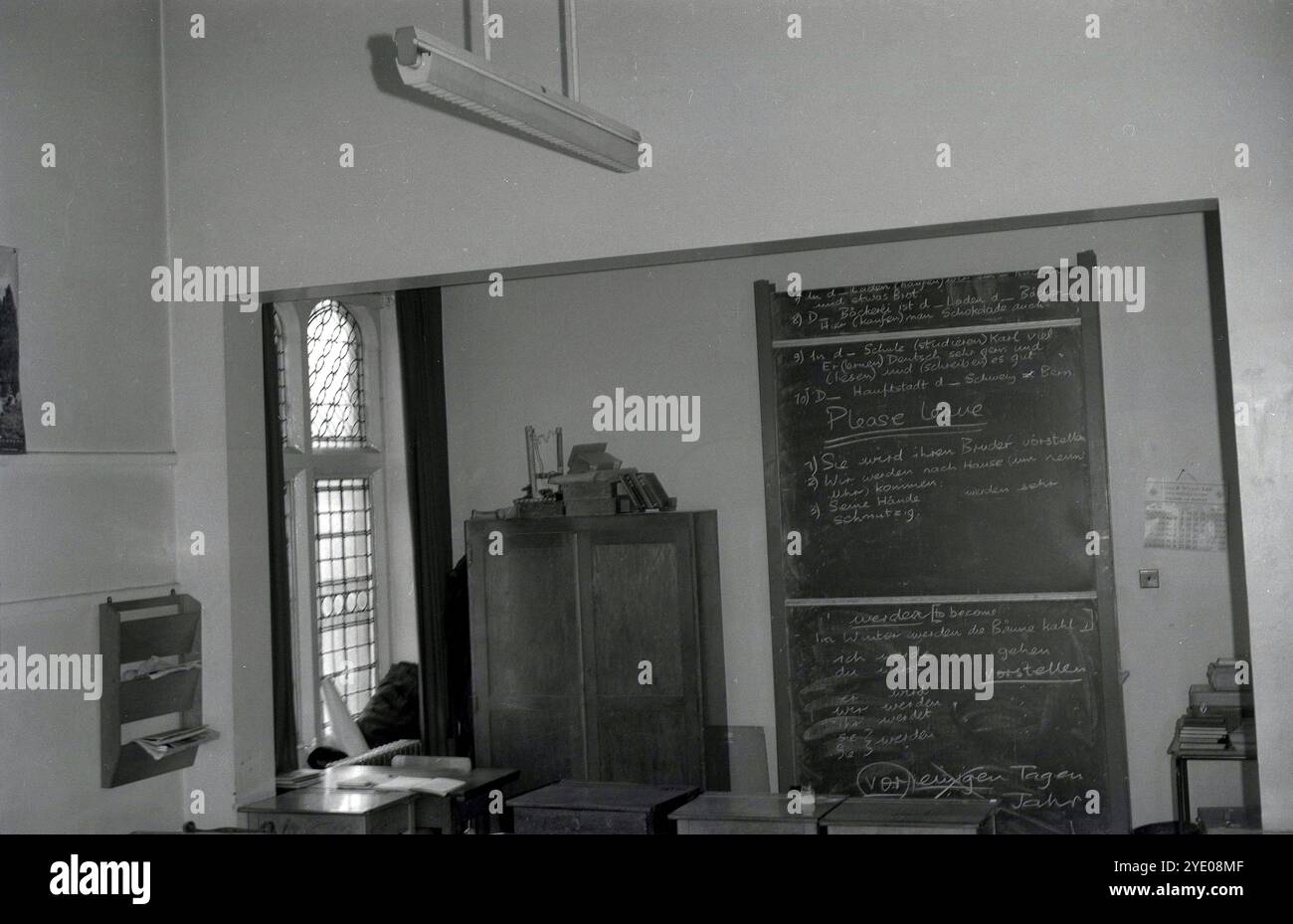 1950s, historical, small classroom of a private school, German lesson ...