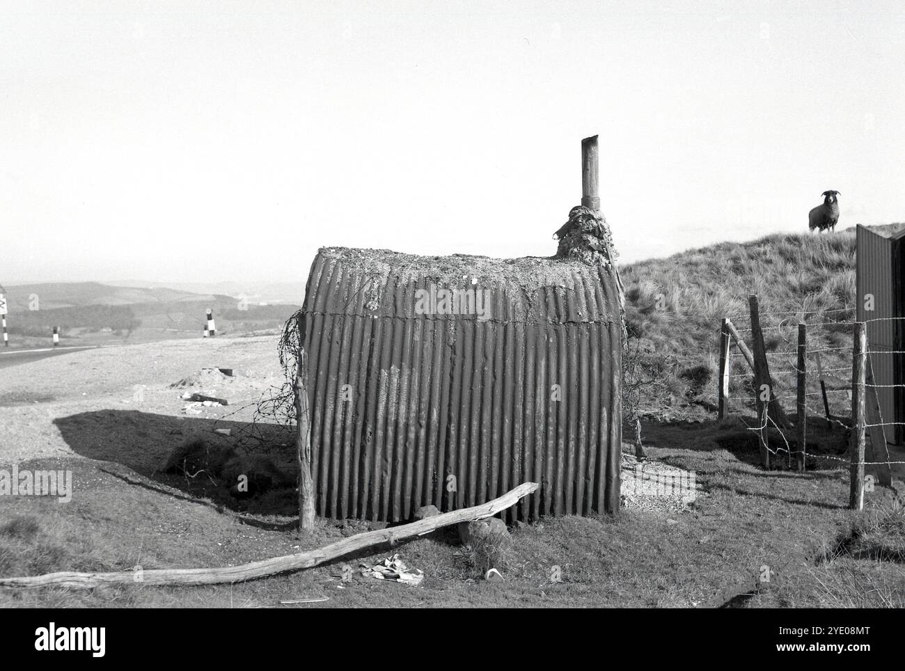 1950s, historical, small wrought iron hut with exterior stove pipe ...