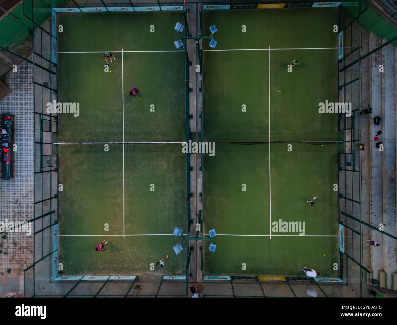Aerial vertical view of people playing paddle tennis Stock Photo - Alamy
