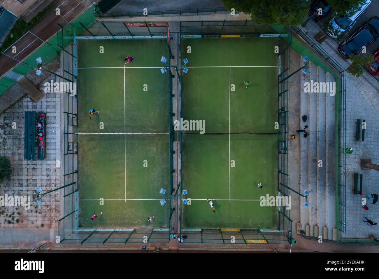 Aerial vertical view of people playing paddle tennis Stock Photo - Alamy