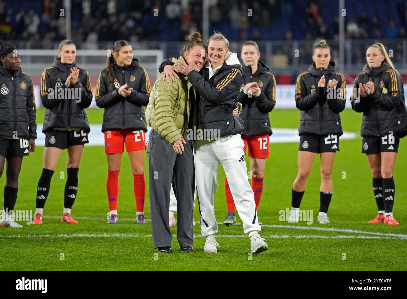 Germany's Alexandra Popp and Marina Hegering, from right, say goodbye ...