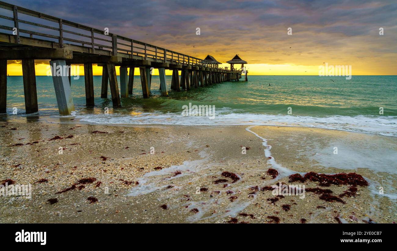 Beautiful sunset at naples pier hi-res stock photography and images - Alamy
