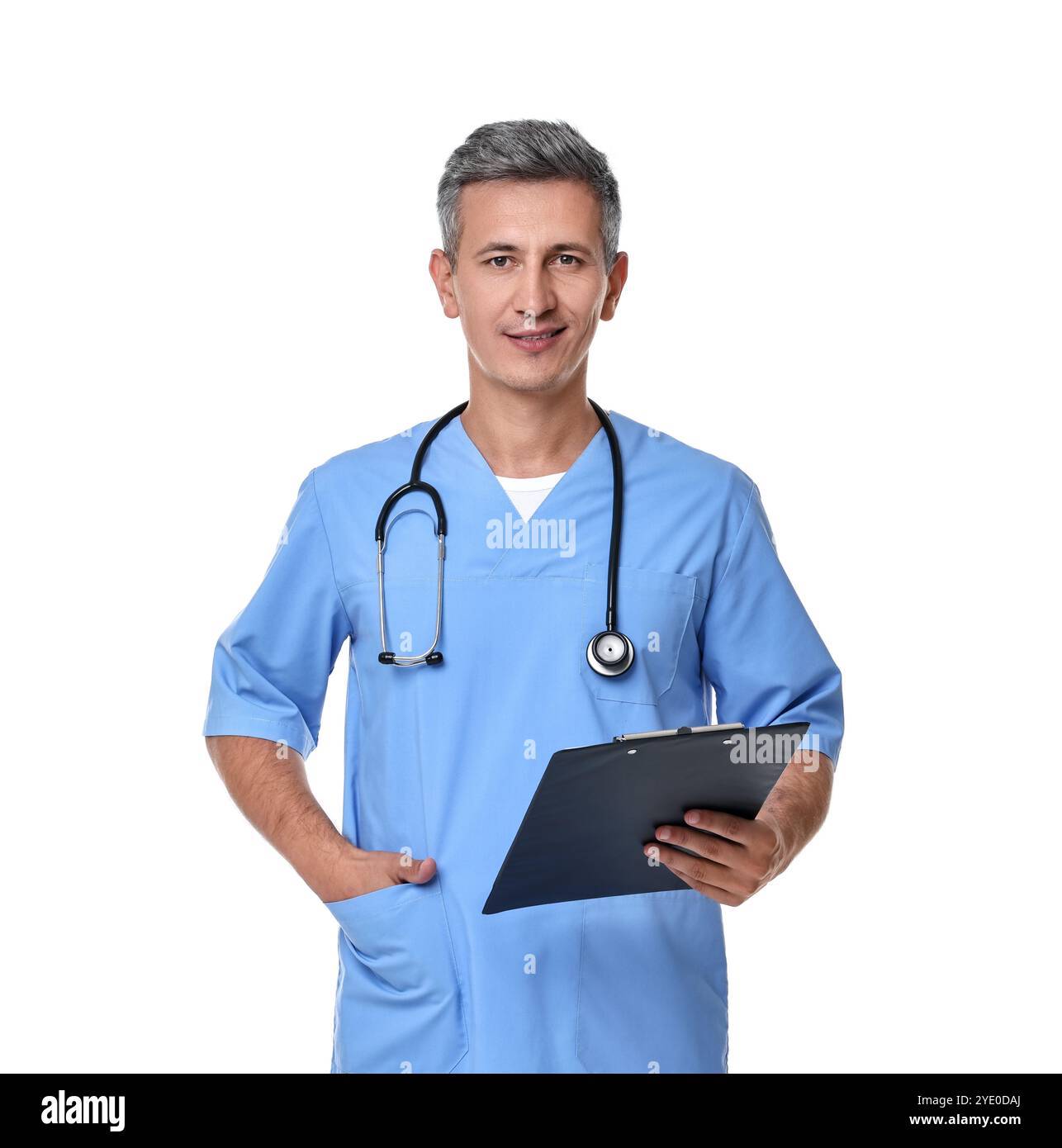 Smiling healthcare worker with stethoscope and clipboard on white ...