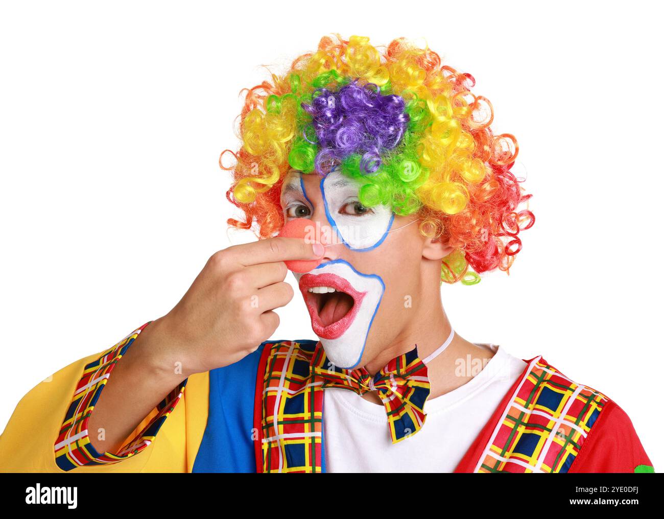 Portrait of emotional clown beeping his nose on white background Stock ...