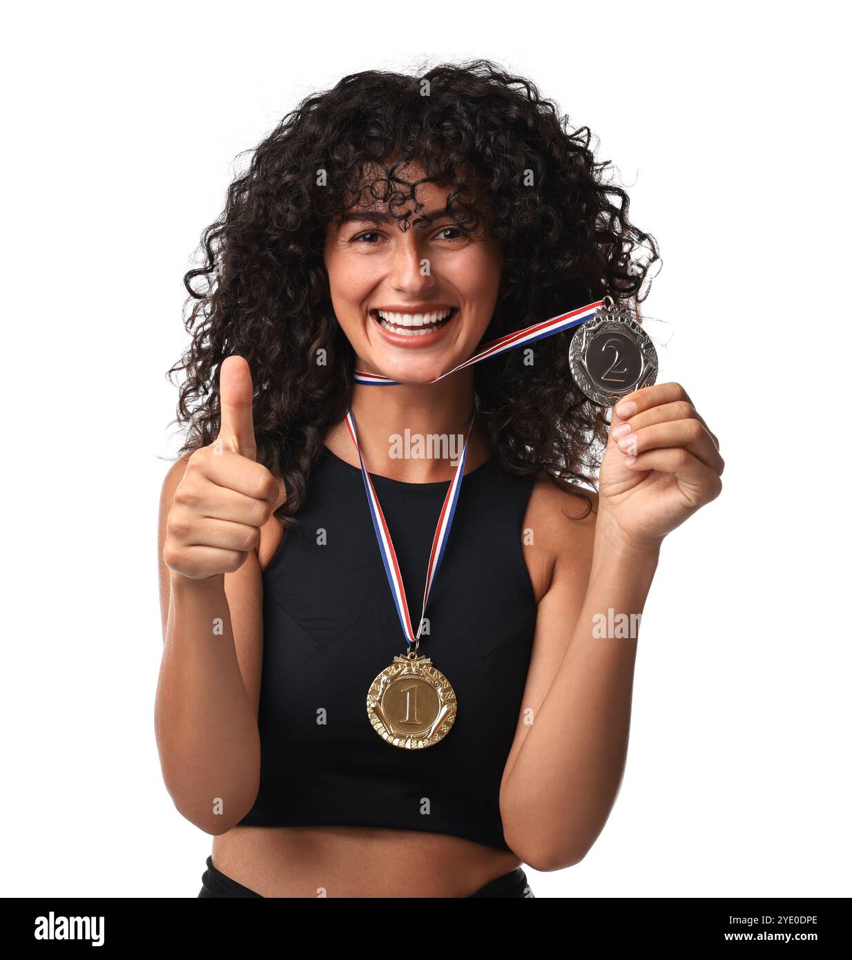 Happy winner with different medals showing thumbs up on white ...