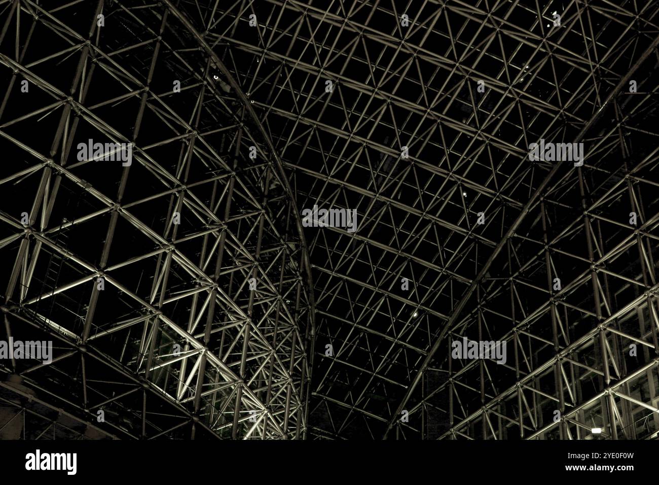 A huge structure with a geometric design made up of many steel pipes ...
