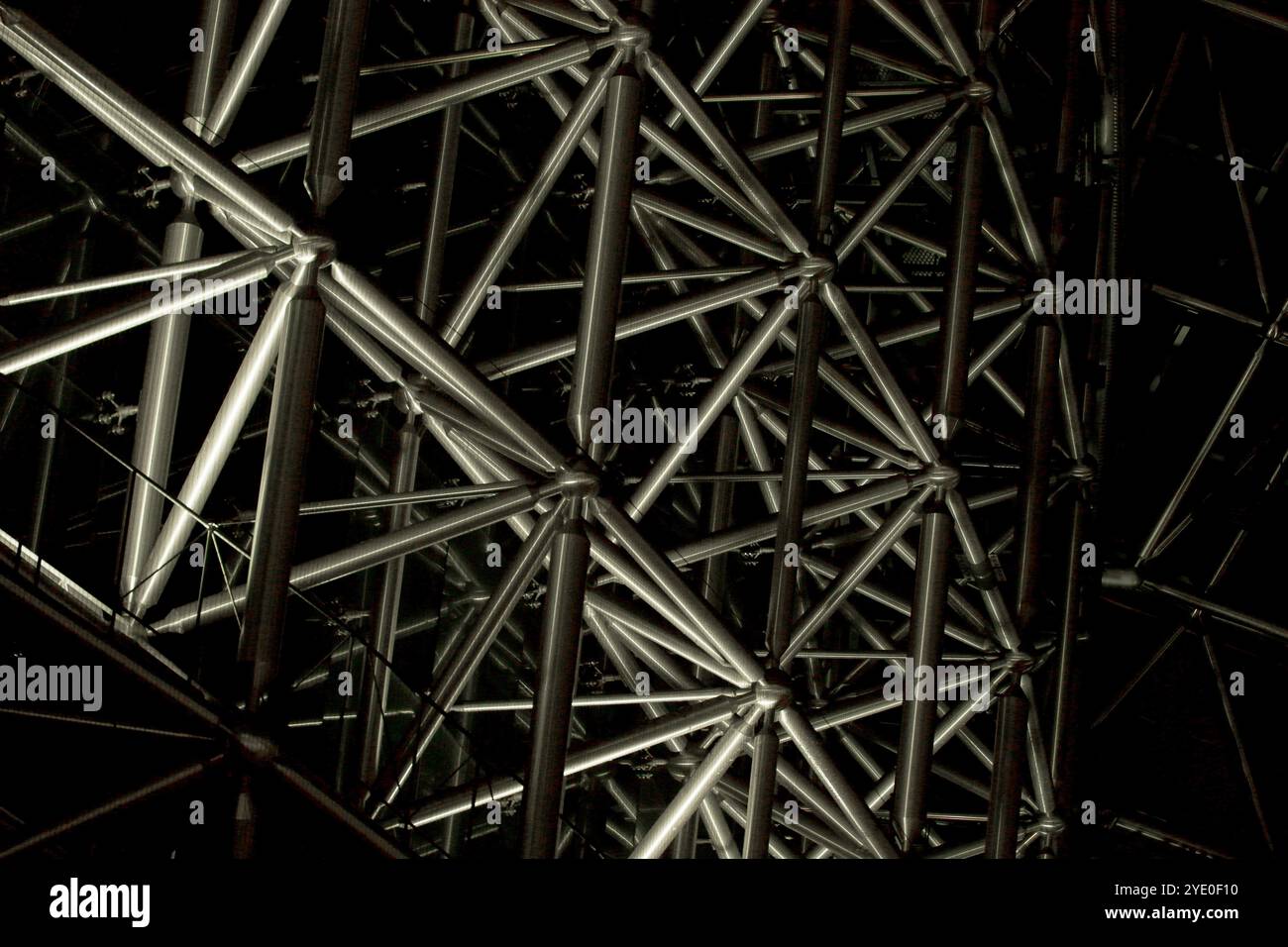 A huge structure with a geometric design made up of many steel pipes ...