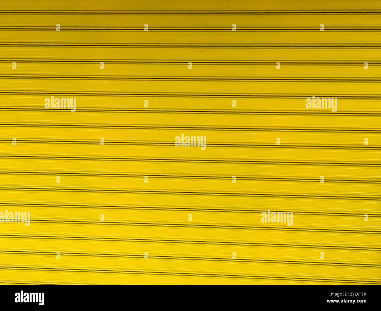 Yellow Metal Background: Textured Square Cover of Closed Store Stock ...