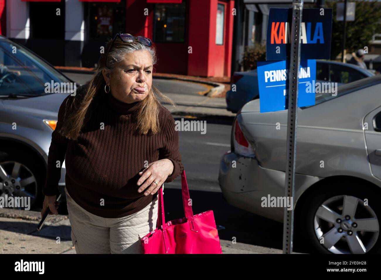 Ivonne Concepcion reacts while discussing remarks made by a speaker at ...