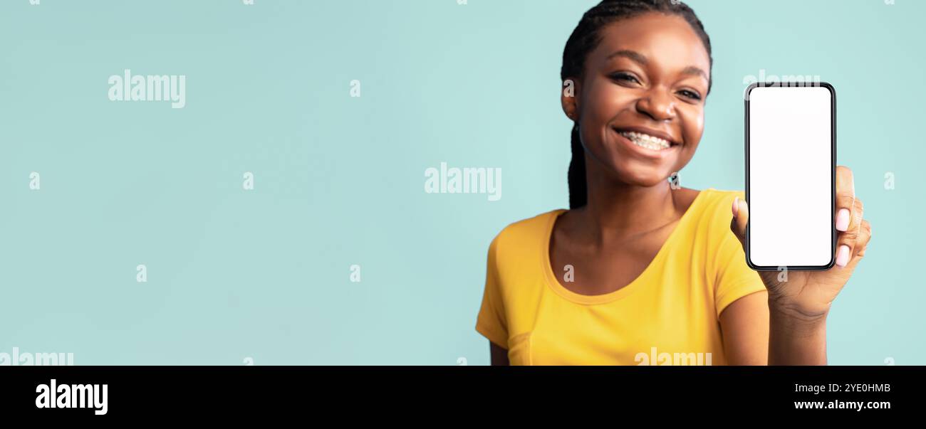 Lady Showing Smartphone Blank Screen Over Blue Studio Background ...
