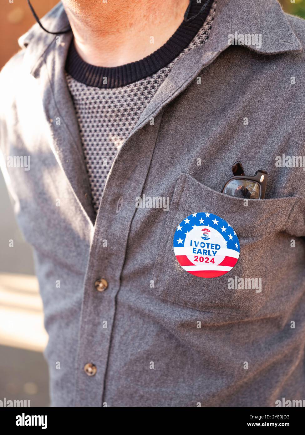 Close up of "I voted Early" sticker on man's shirt - Concept of Early ...