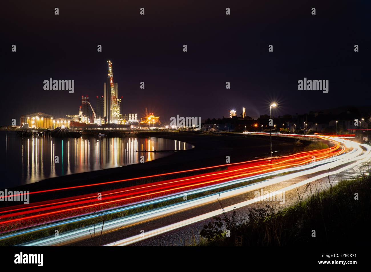 Light trails on the road to Cromarty. Wind orca lit up in Nigg loading ...