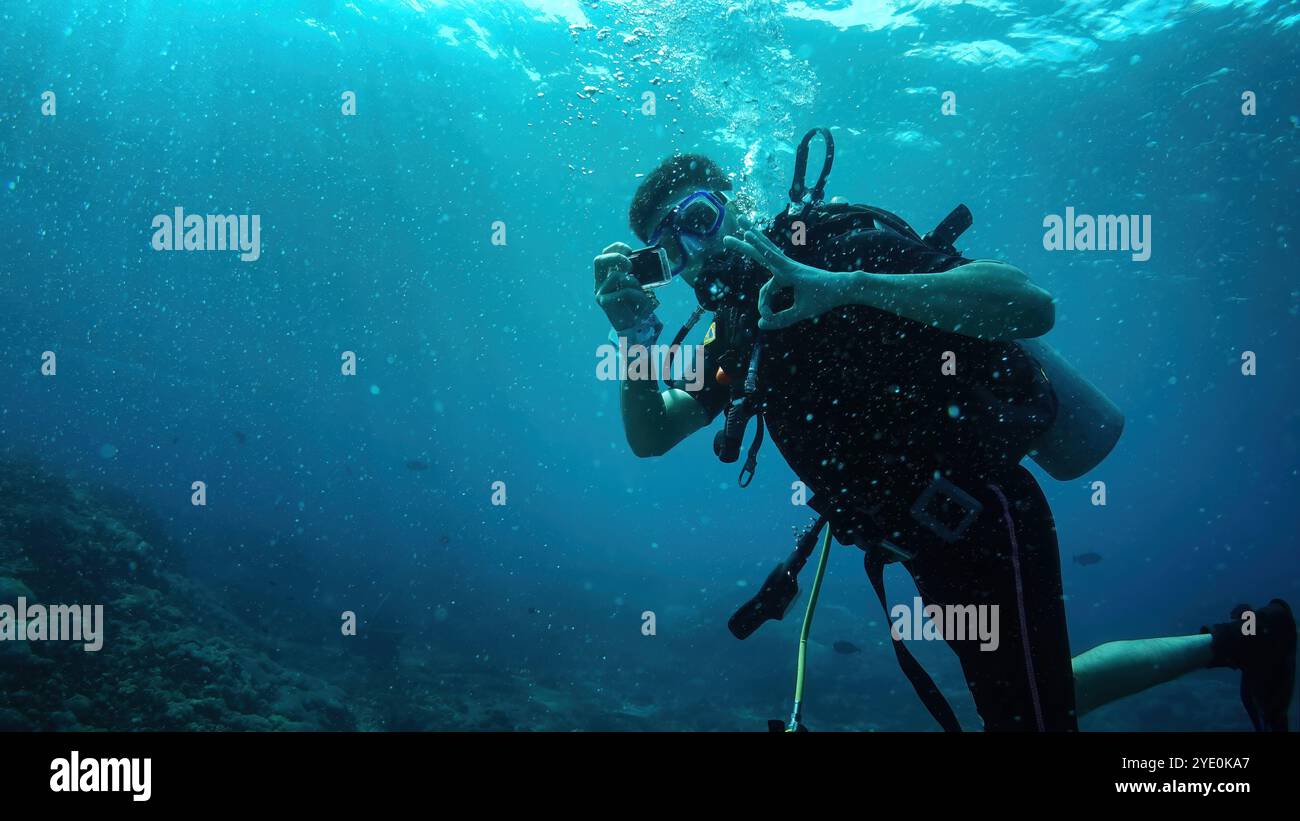 Capture stunning underwater photos of a vibrant coral reef while scuba diving in bali. Join this ...