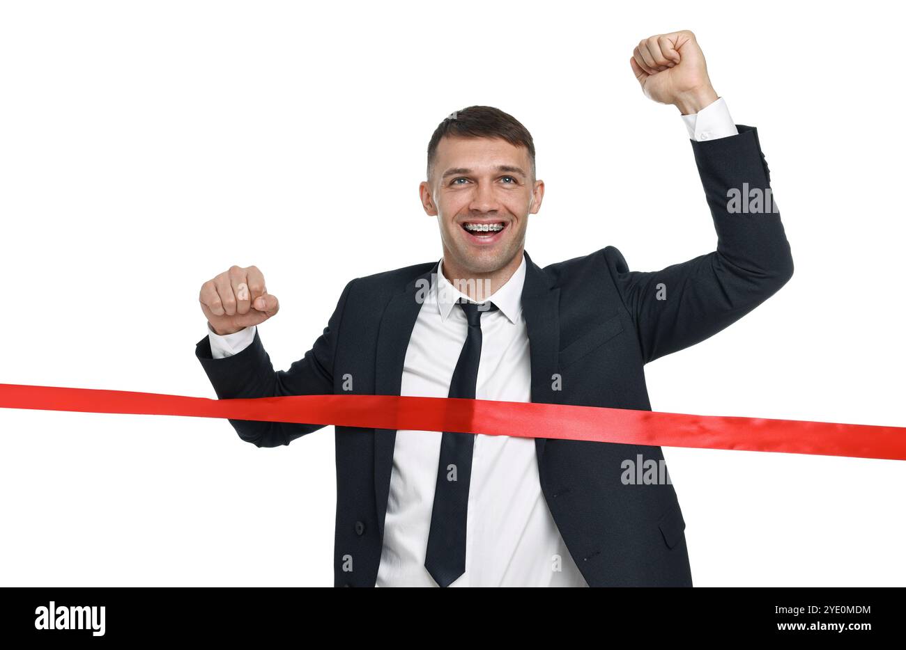 Businessman in suit crossing red finish line on white background Stock ...