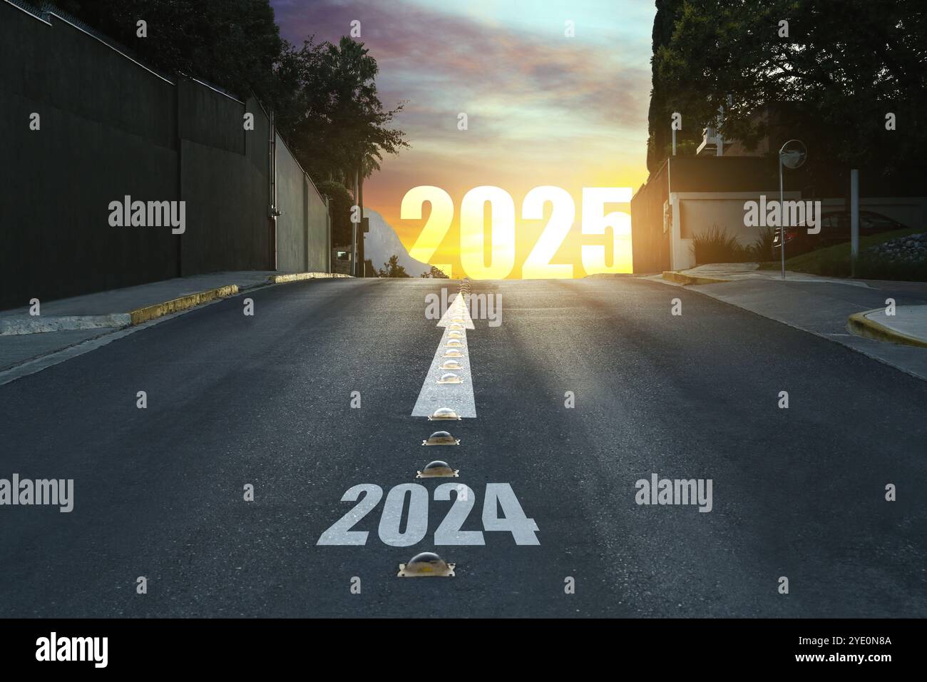 Asphalt road with arrow and 2024 leading to 2025 sign. Concept of new ...