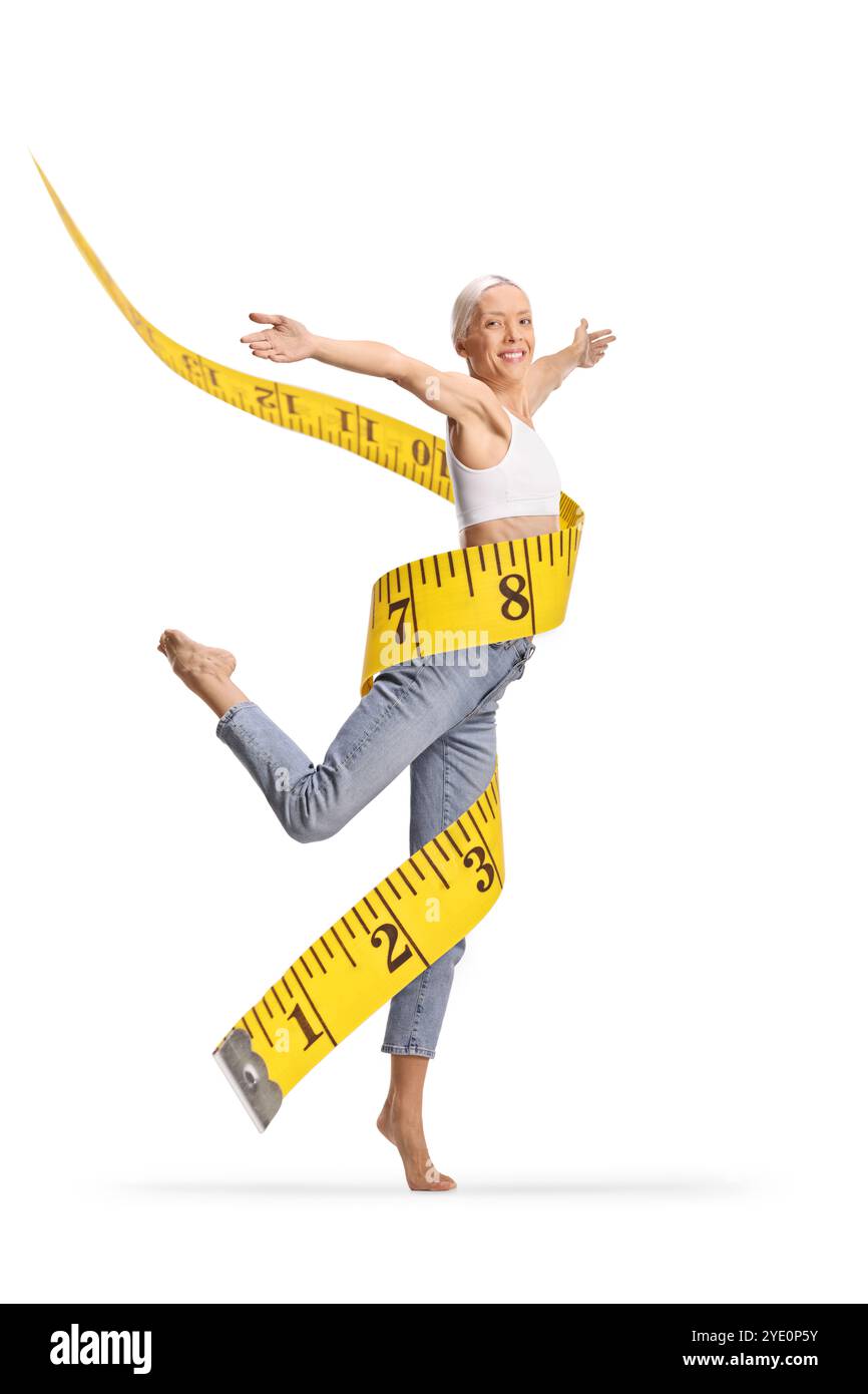Happy slim woman with measuring tape around her body isolated on white ...