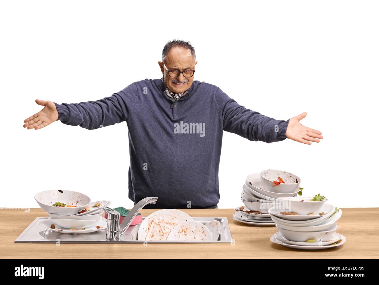 Angry mature man with a pile of dirty dishes in a kitchen sink isolated ...