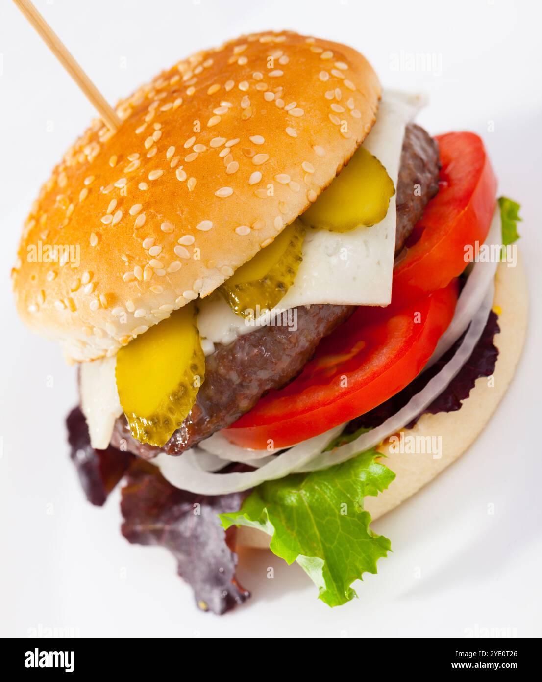 Image of burger with beef, tomato, cheese, cucumber and lettuce Stock ...