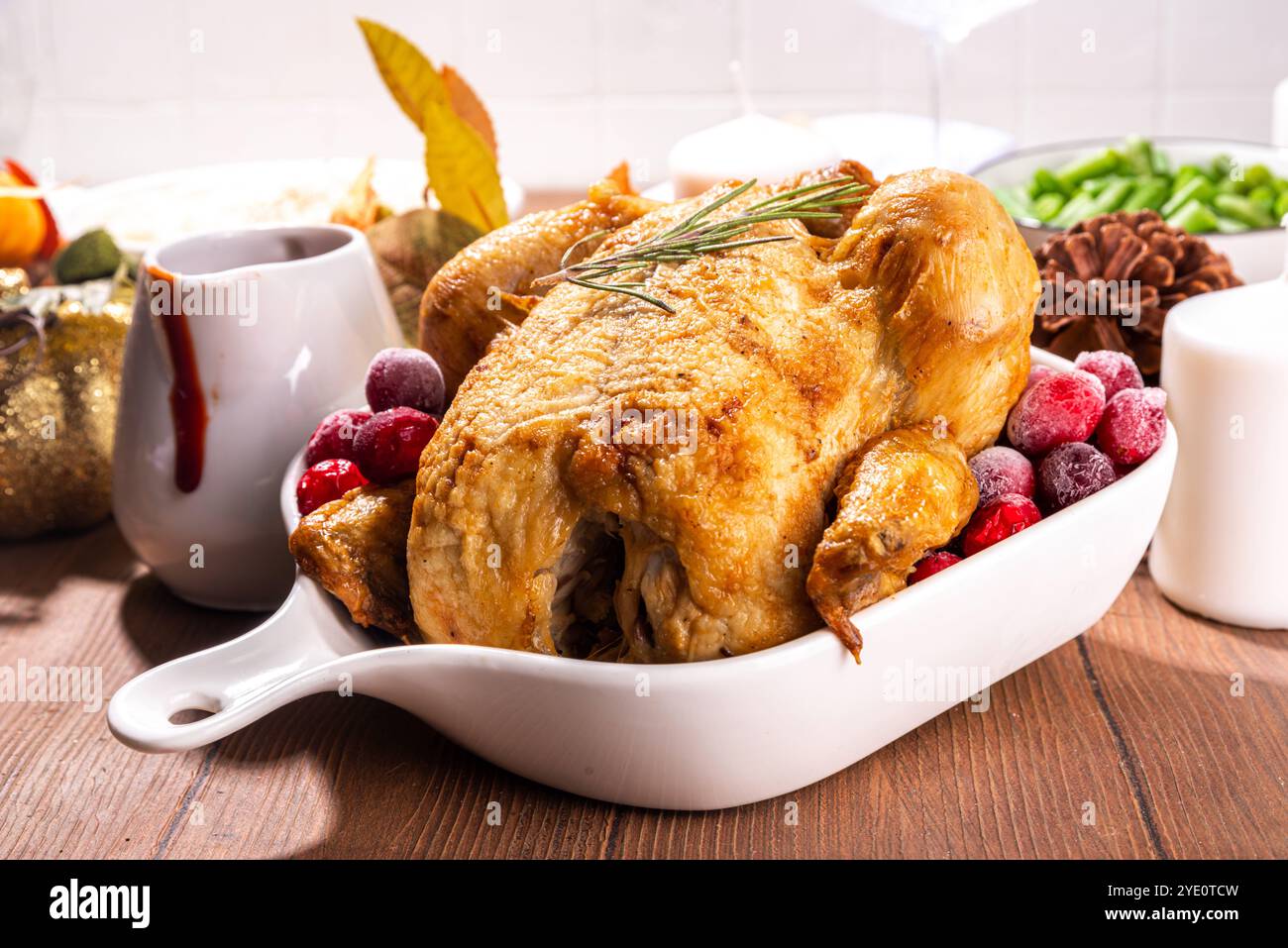 Thanksgiving family party dinner table setting with plates, cutlery ...