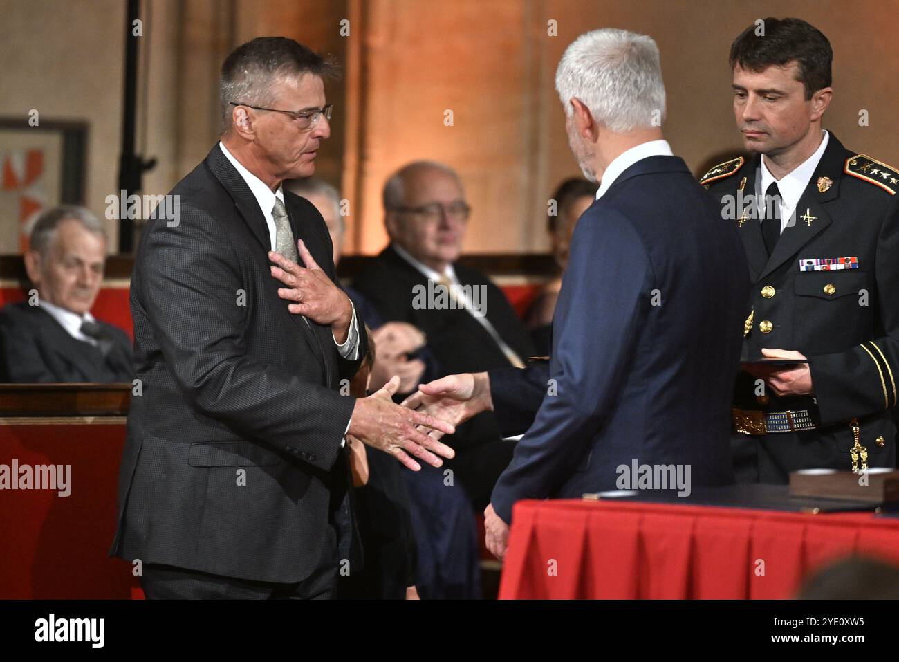 Czech President Petr Pavel (middle) bestowed the Order of Tomas ...