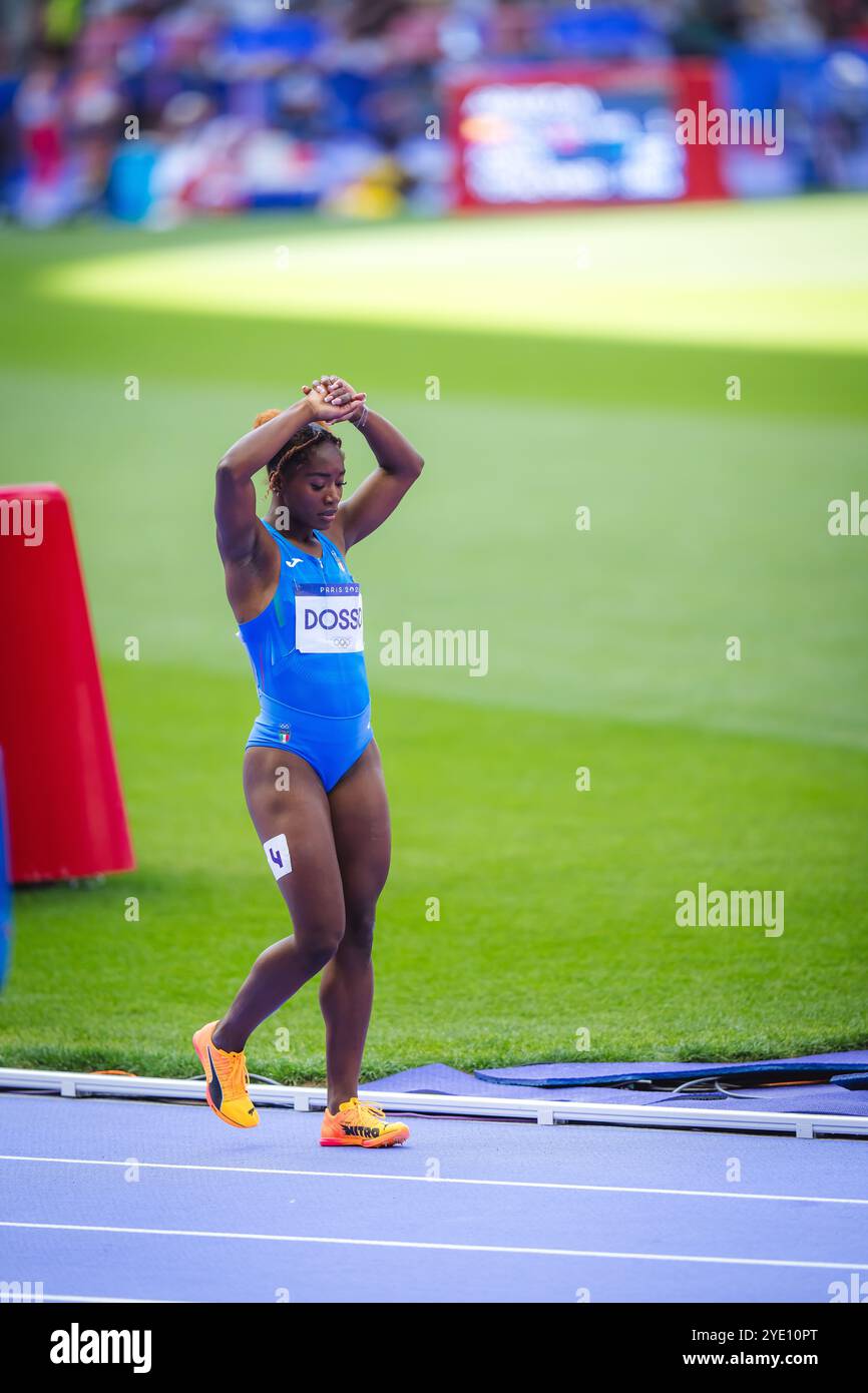 Zaynab Dosso participating in the 4x100 meters relay at the Paris 2024 ...