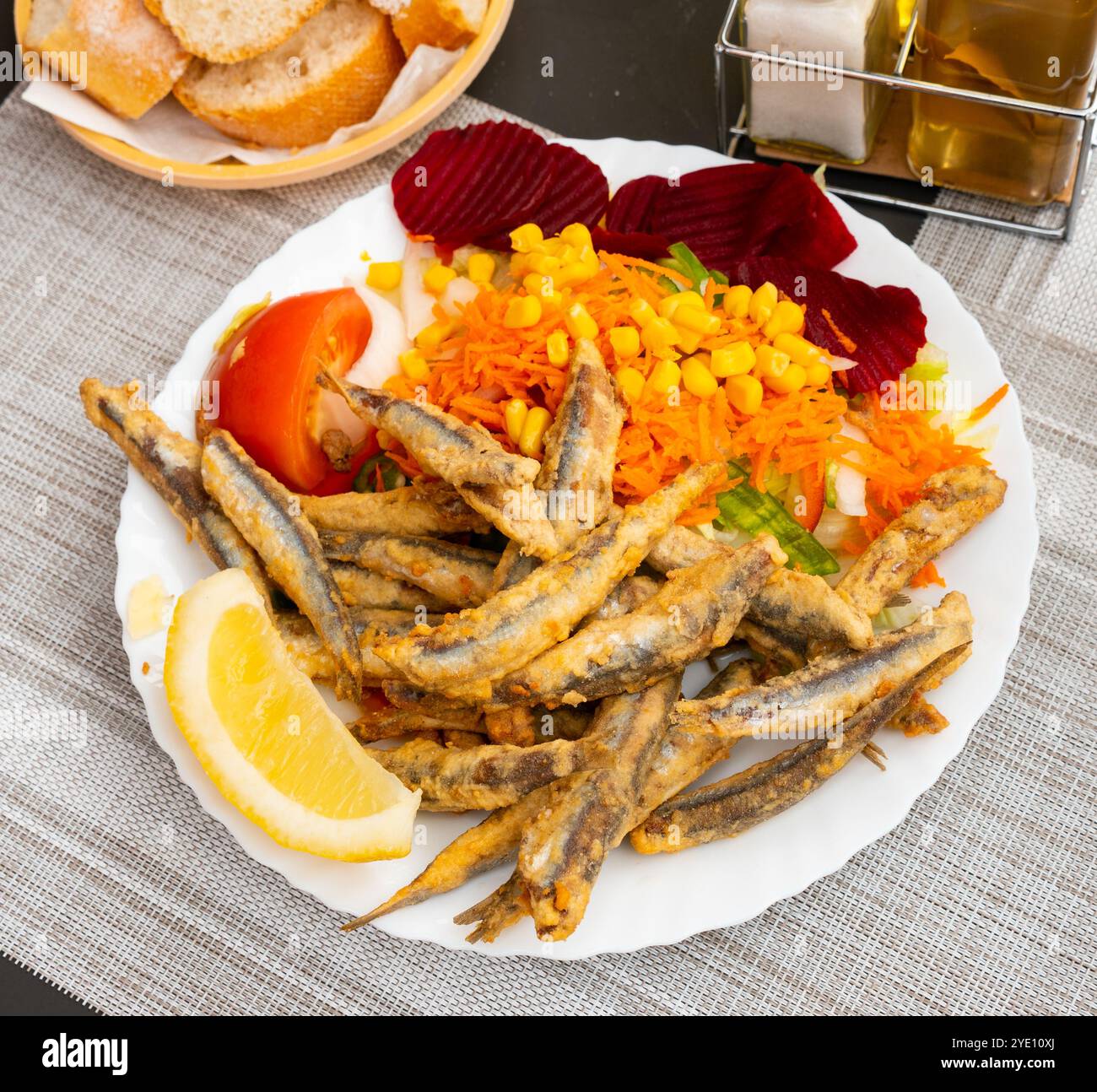 Appetizer cooked anchovies (Boquerones) with vegetable garnish Stock ...