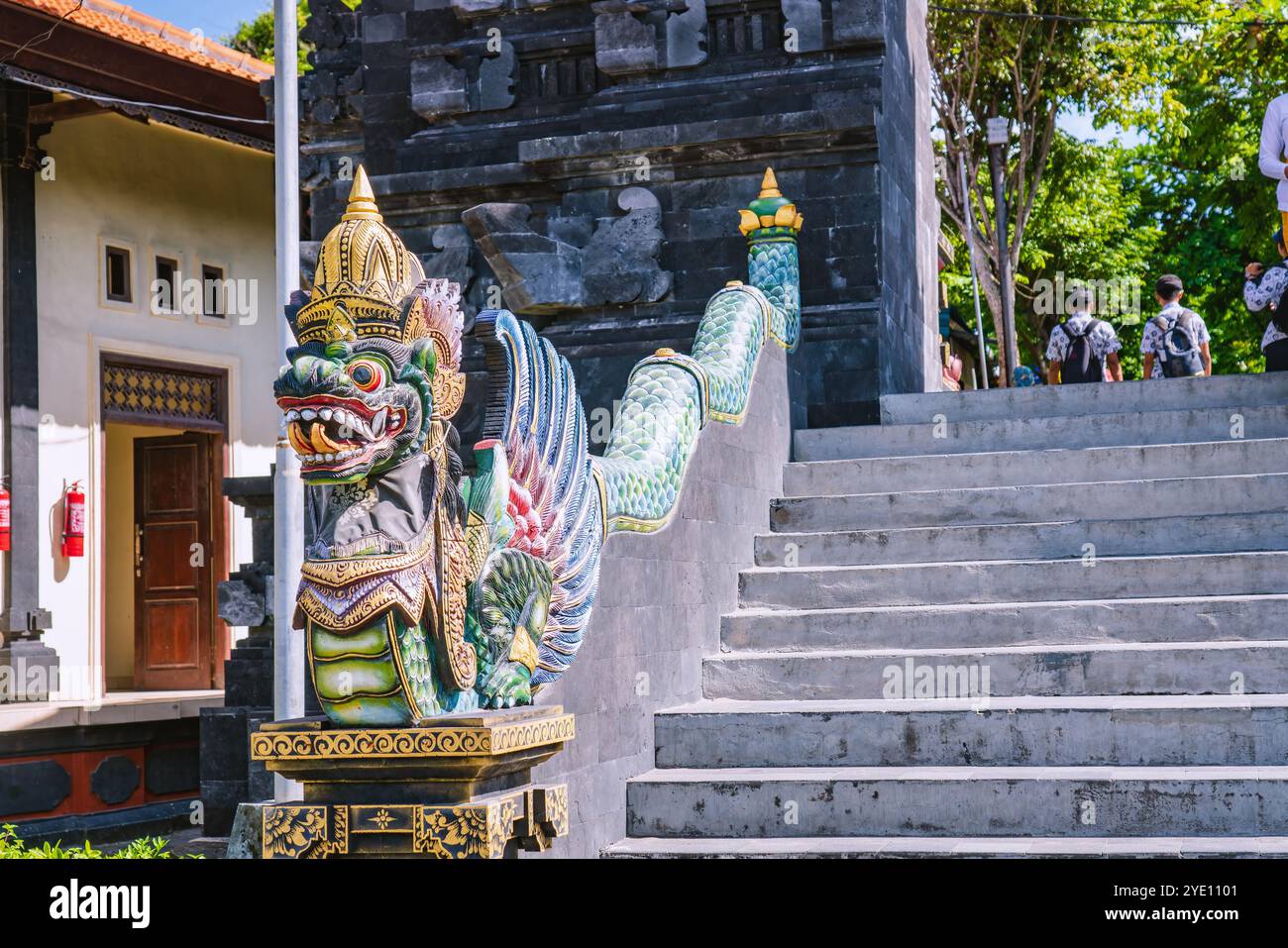 Vibrant dragon statue guarding entrance to Tanah lot temple in Bali ...