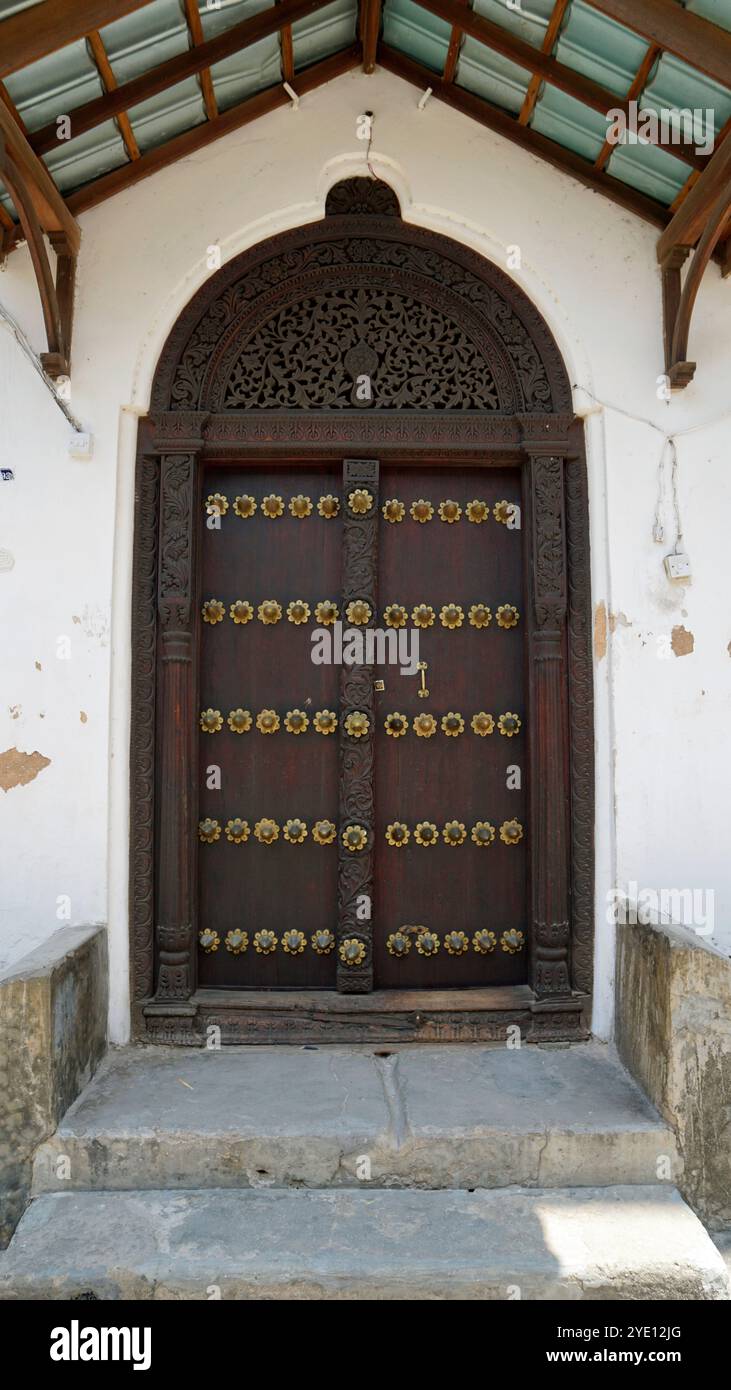traditional wooden door in stonetown on zanzibar island Stock Photo - Alamy