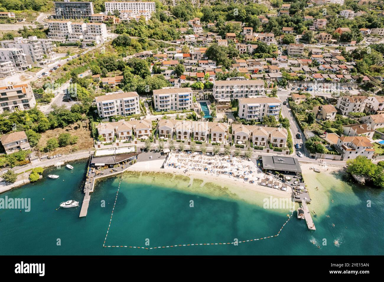 Luxury hotel complex Huma Kotor Bay with a beach on the seashore ...