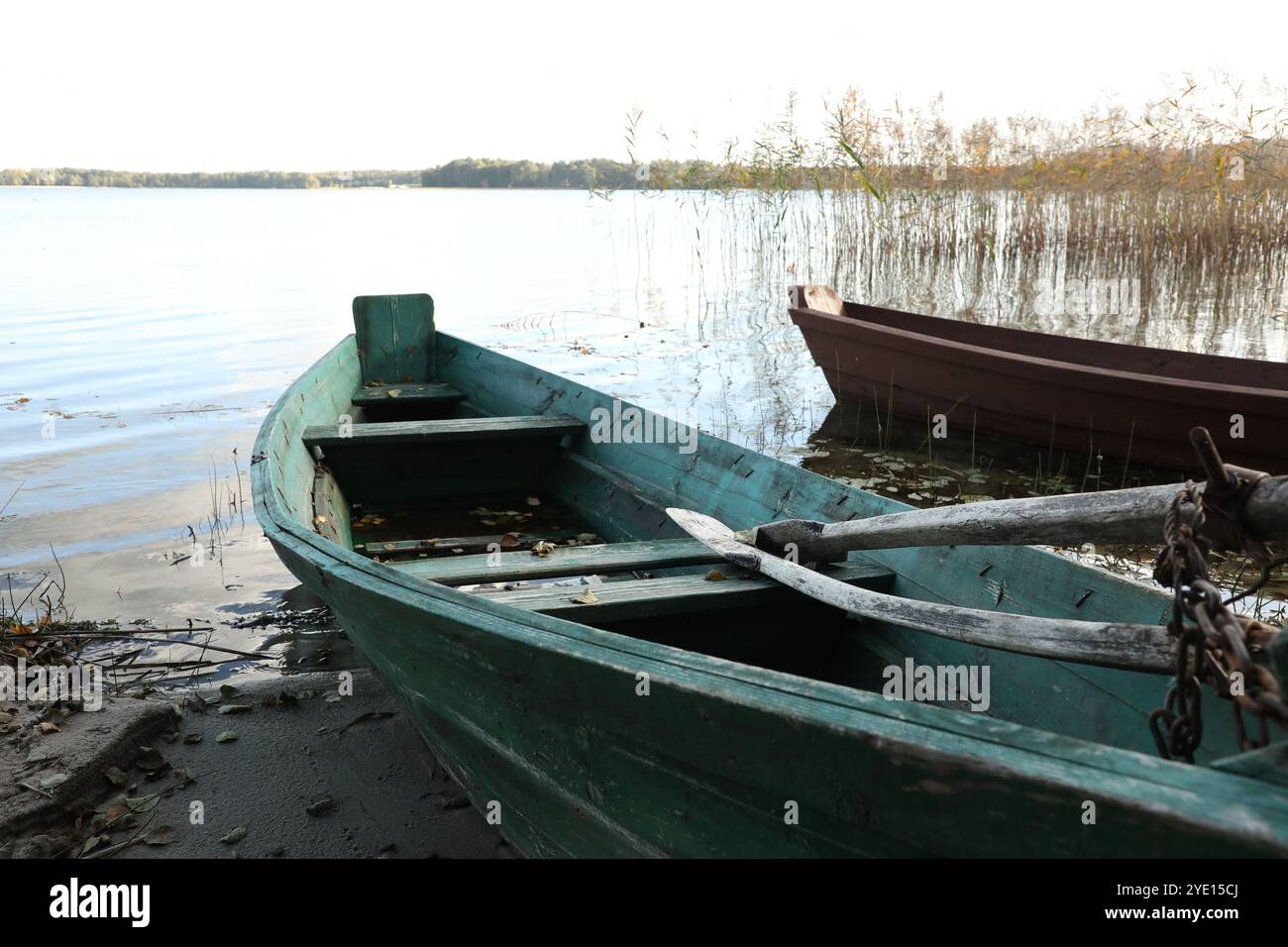 Empty old fishing boats floating hi-res stock photography and images ...