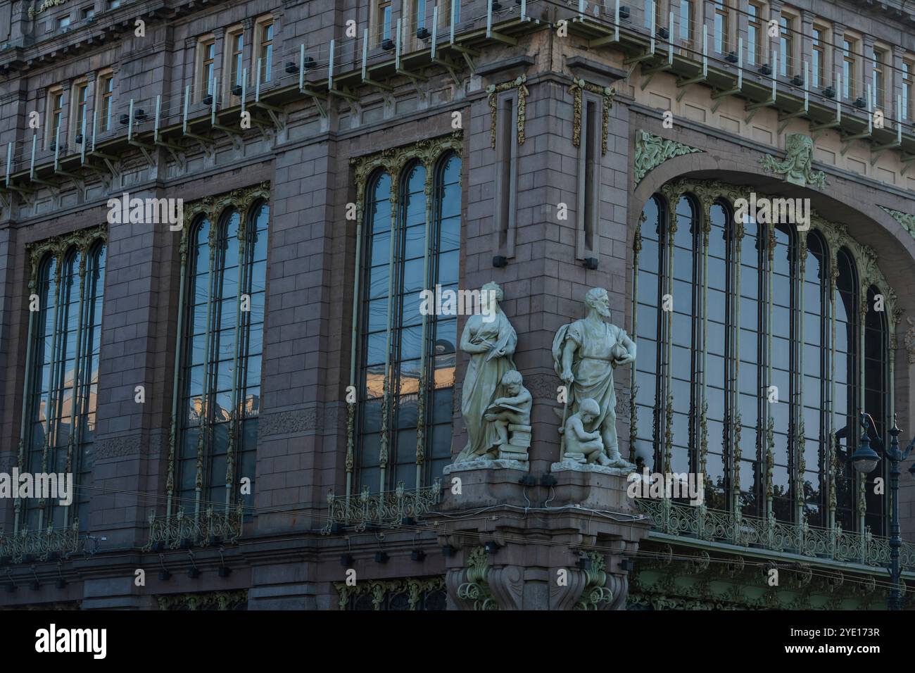 Detailed view of a historic building facade featuring statues and large ...