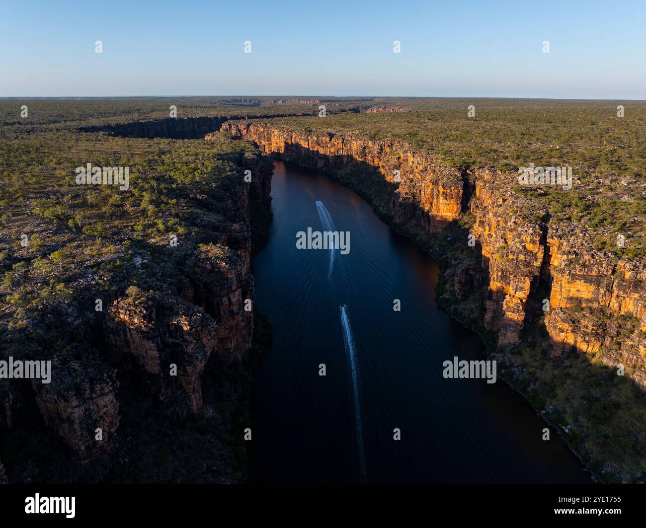 Aerial view of small boats travelling in King George River in The ...
