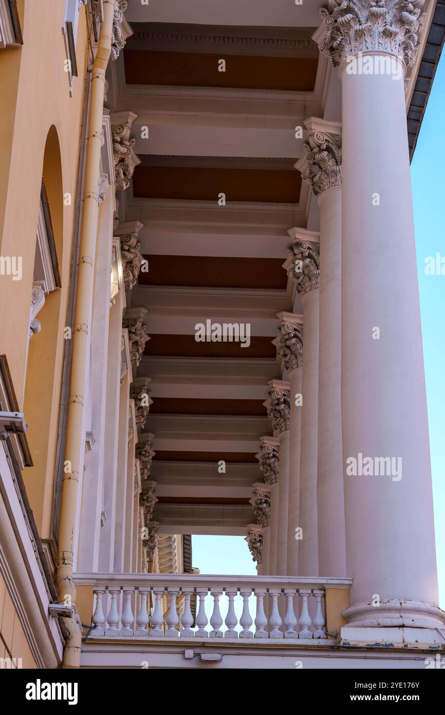 Close-up of a classical colonnade featuring ornate capitals and a ...