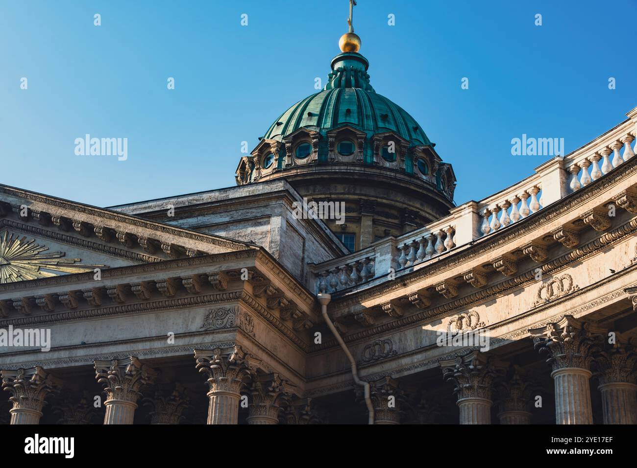 lose-up view of the Kazan Cathedral's ornate dome and classical columns in St. Petersburg ...