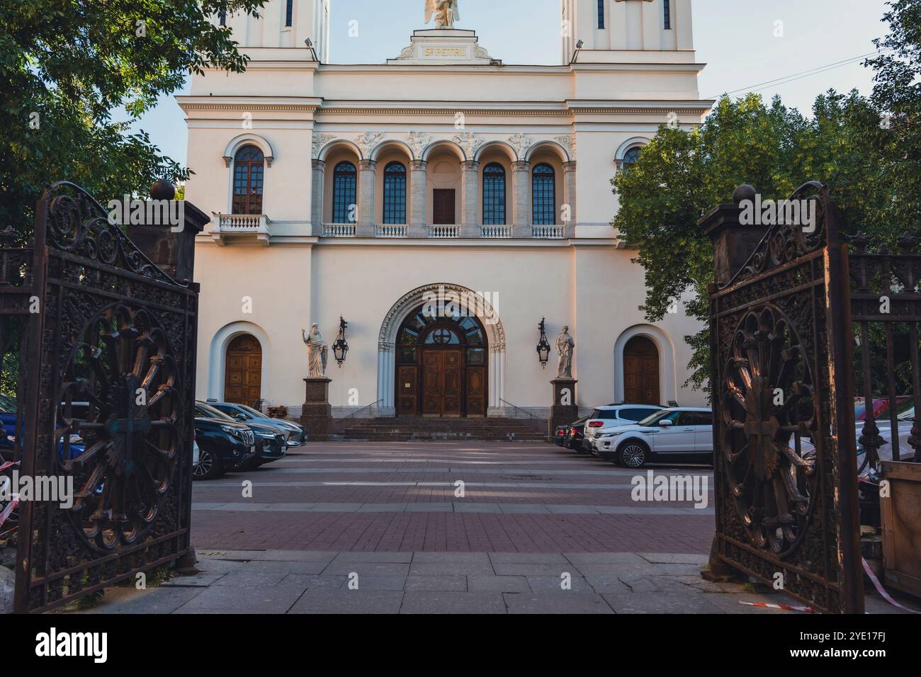 Entrance gate view of historic church building with ornate architecture ...