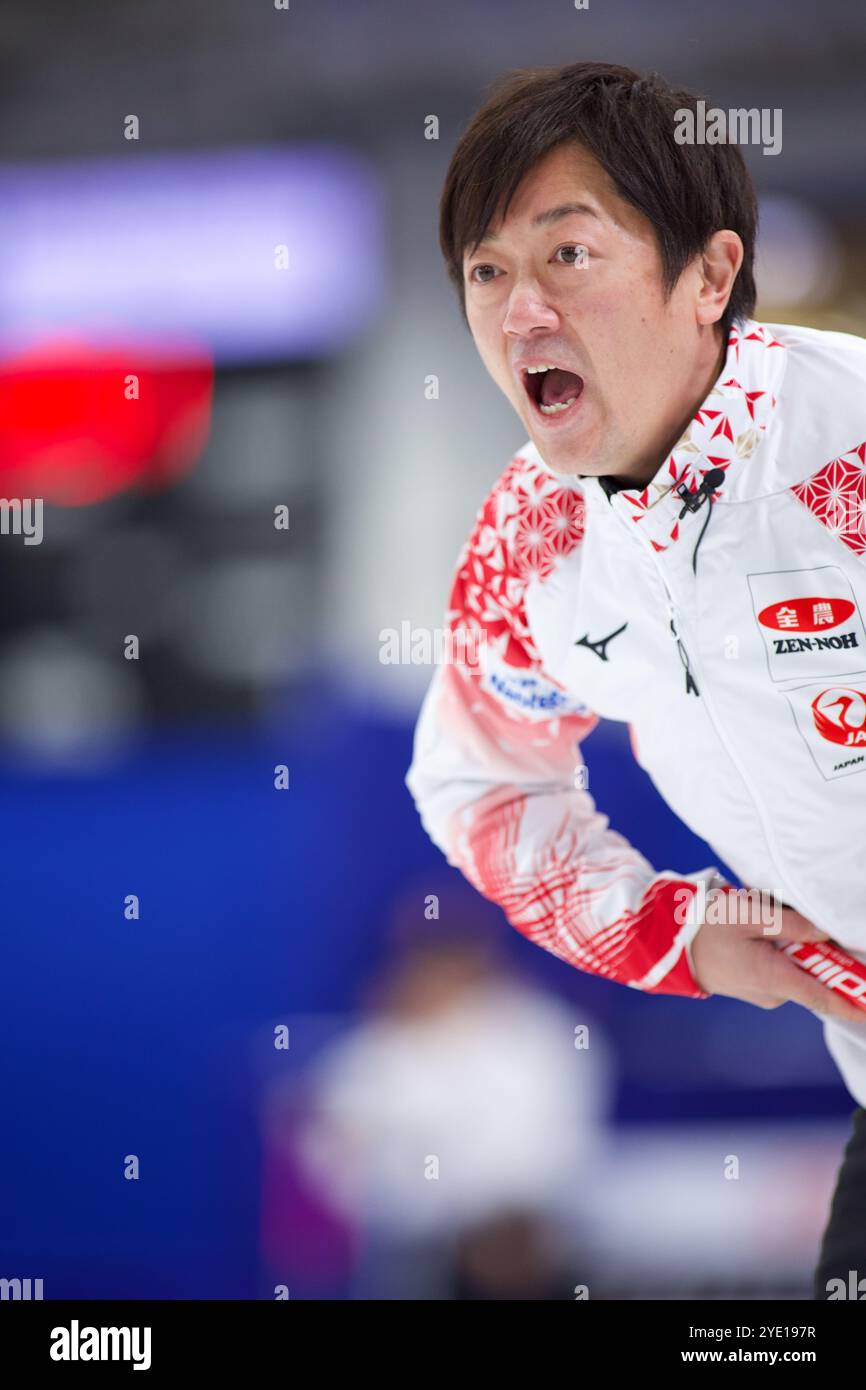 ABE Shinya yells instructions to his sweepers at the 2024 Pan Continental Curling Championship ...