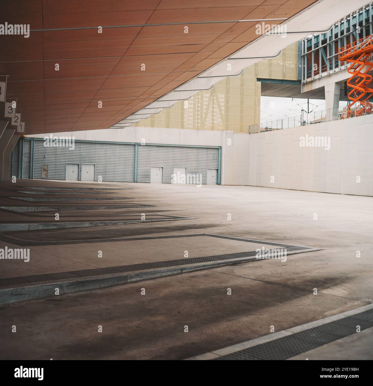 Modern bus stop with, featuring a slanted wooden ceiling, marked ...