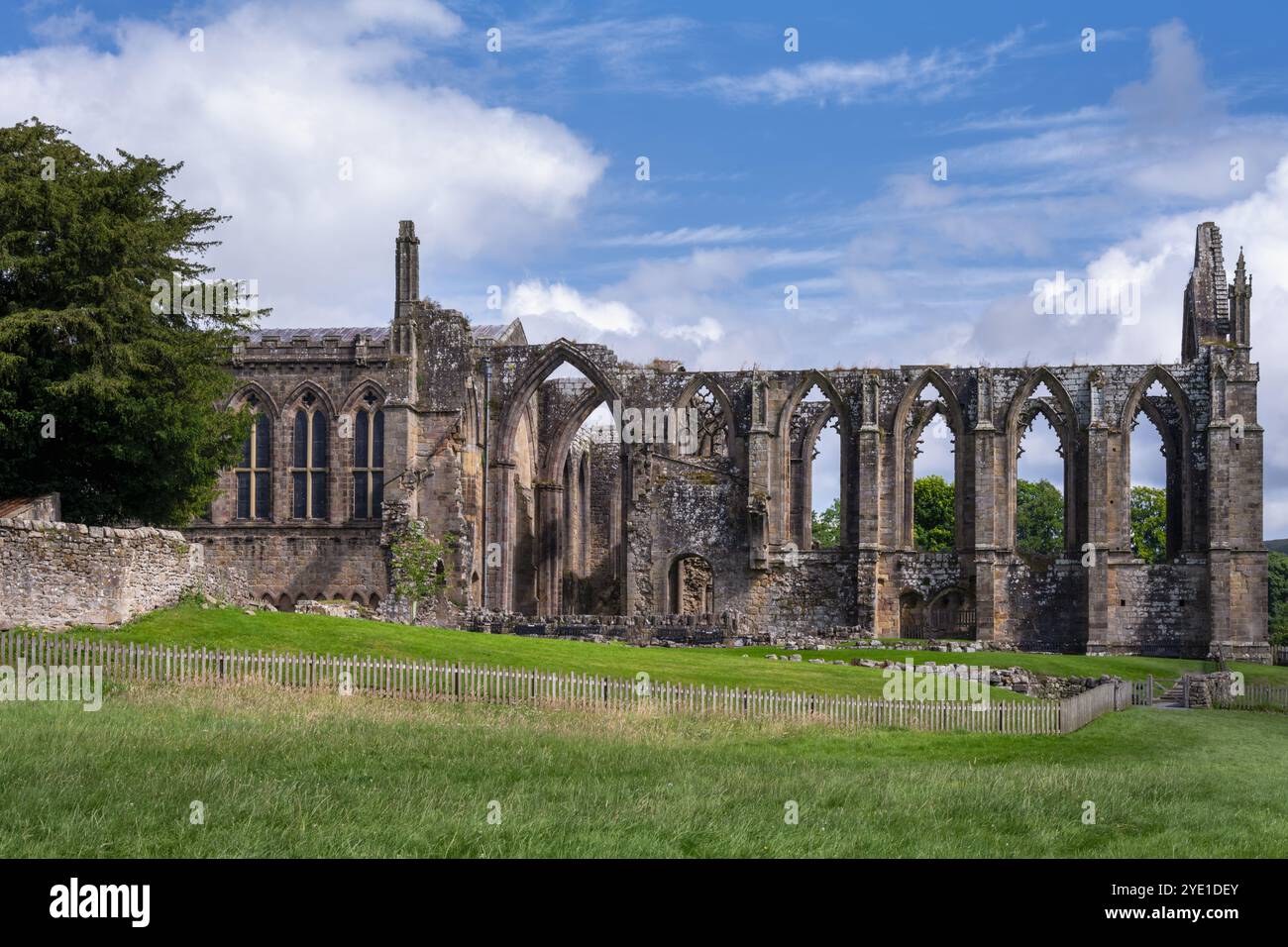 View of the Priory Church of St. Mary and St. Cuthbert and the ruins of ...