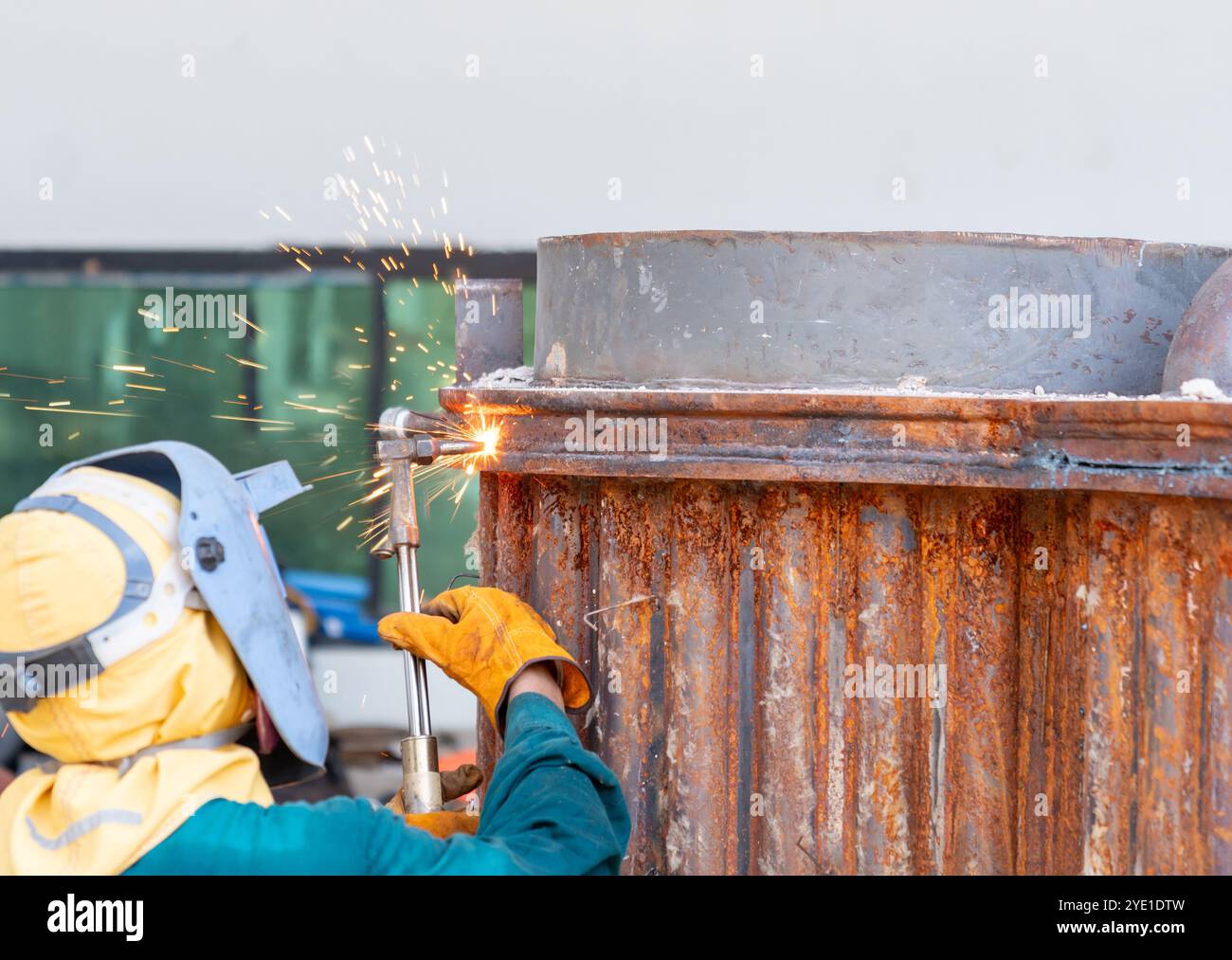 Worker in safety gear uses hi-res stock photography and images - Alamy