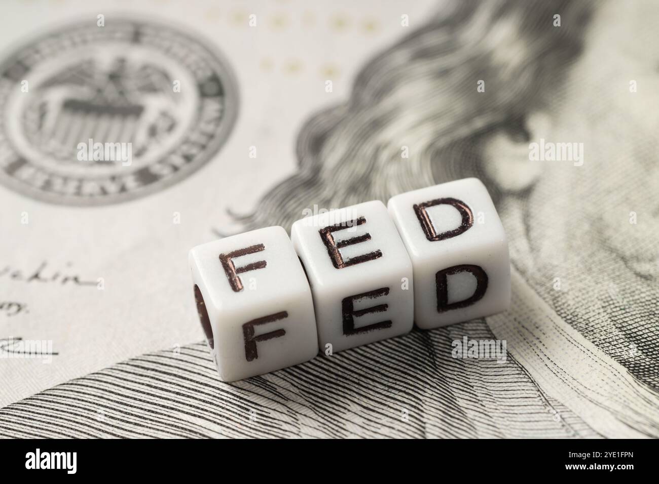 Cubes with letters Fed (Federal Reserve System) on dollar banknote ...