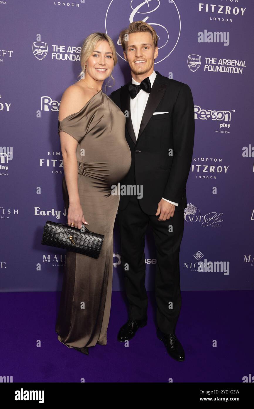 London, UK. 29th Oct, 2024. Helene Spilling and Martin Ødegaard attend ...