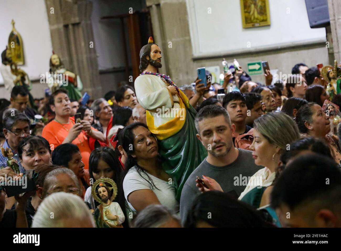 Mexico City, Mexico. 28th Oct, 2024. Devotees of the Saint St. Jude Thaddeus, attend the Church ...